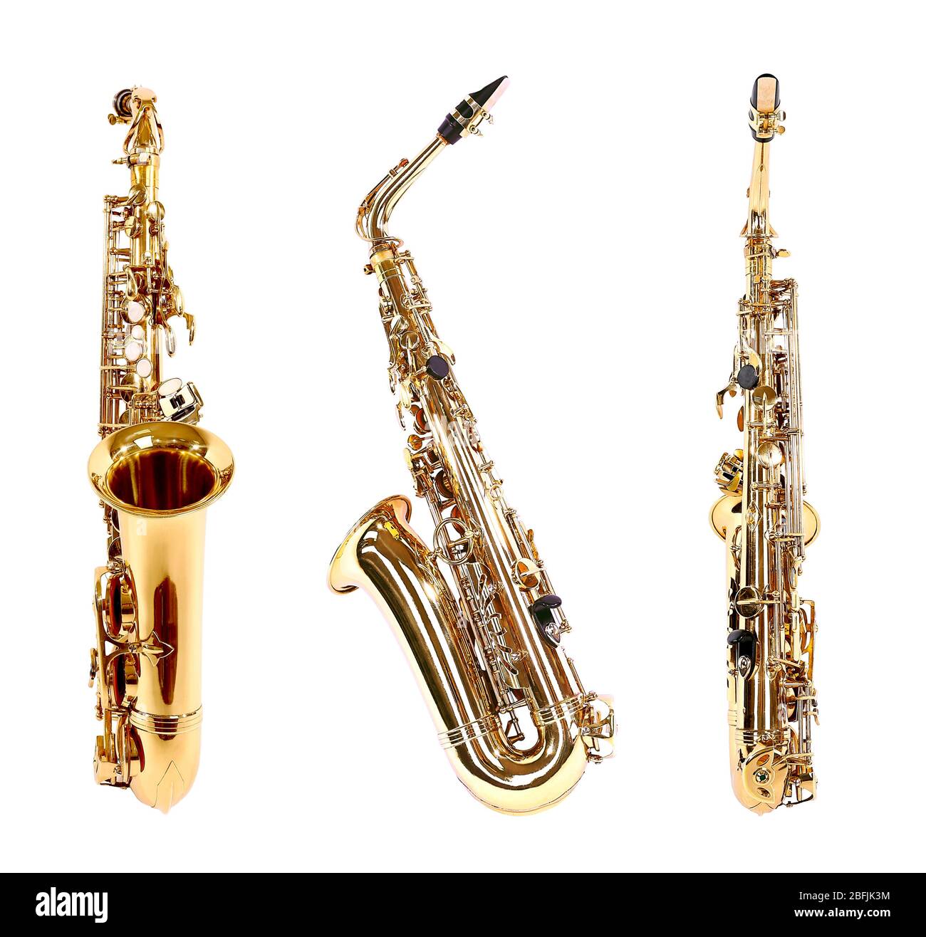 Golden saxophones isolated on white Stock Photo - Alamy