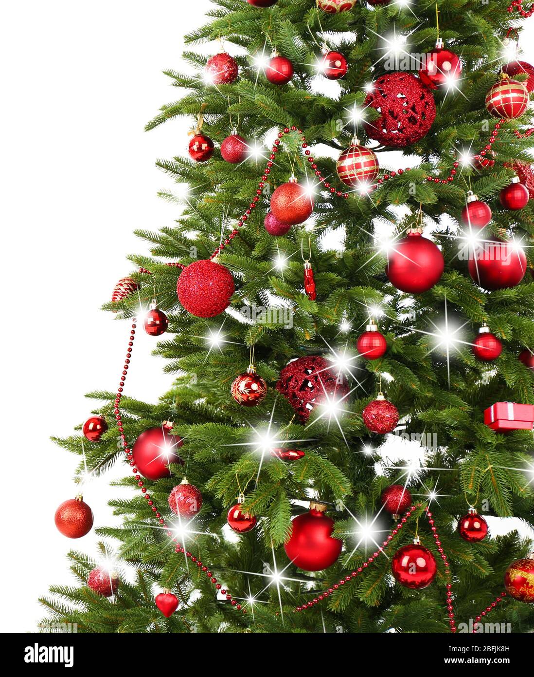 Decorated Christmas tree isolated on white Stock Photo - Alamy