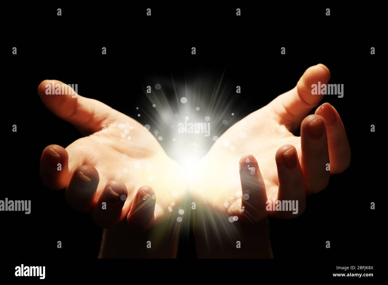 Hands outstretched in prayer hi-res stock photography and images - Alamy