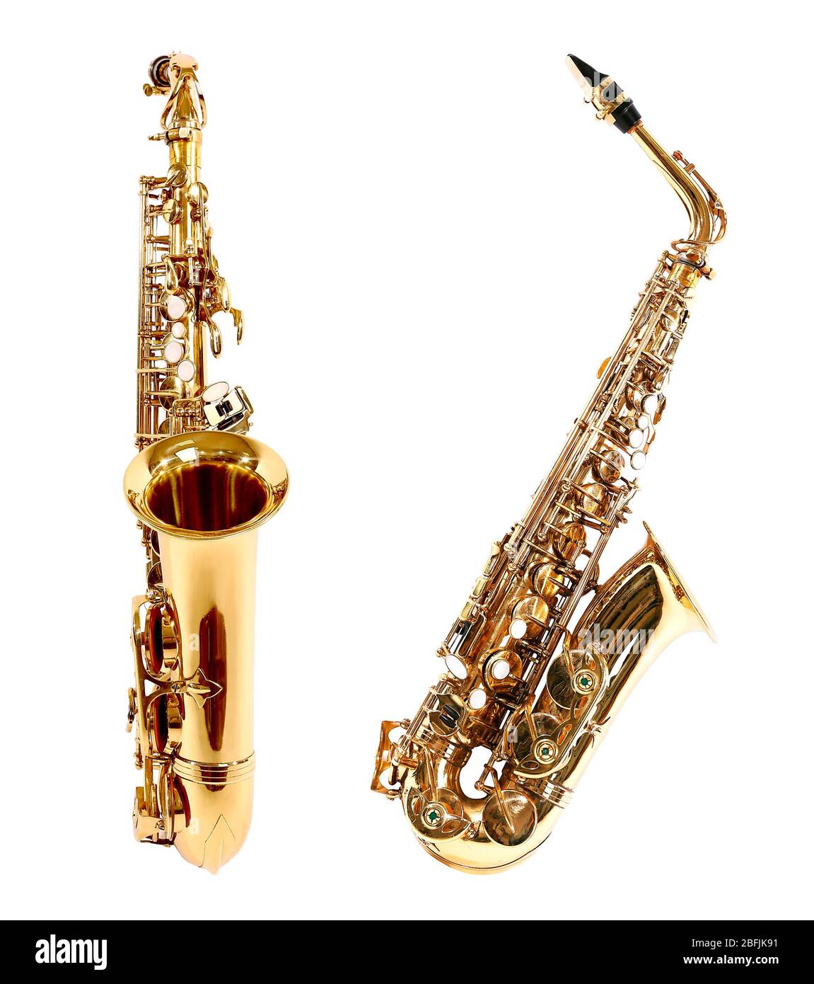 Golden saxophones isolated on white Stock Photo - Alamy