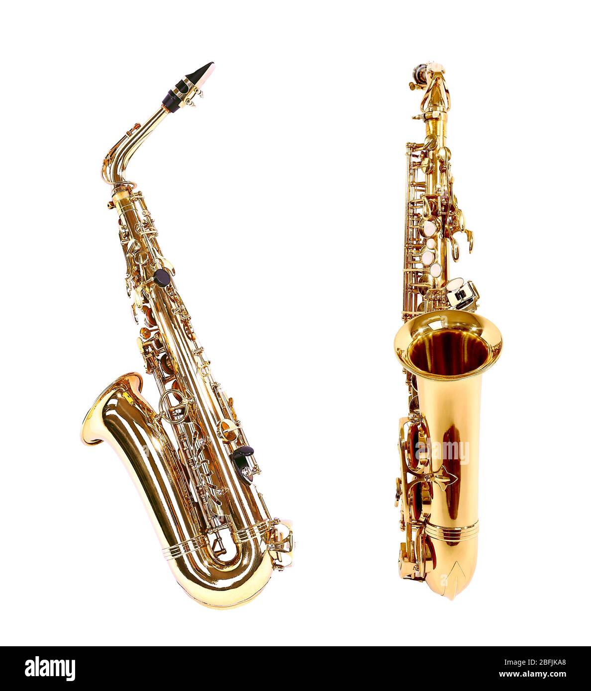 Golden saxophones isolated on white Stock Photo - Alamy