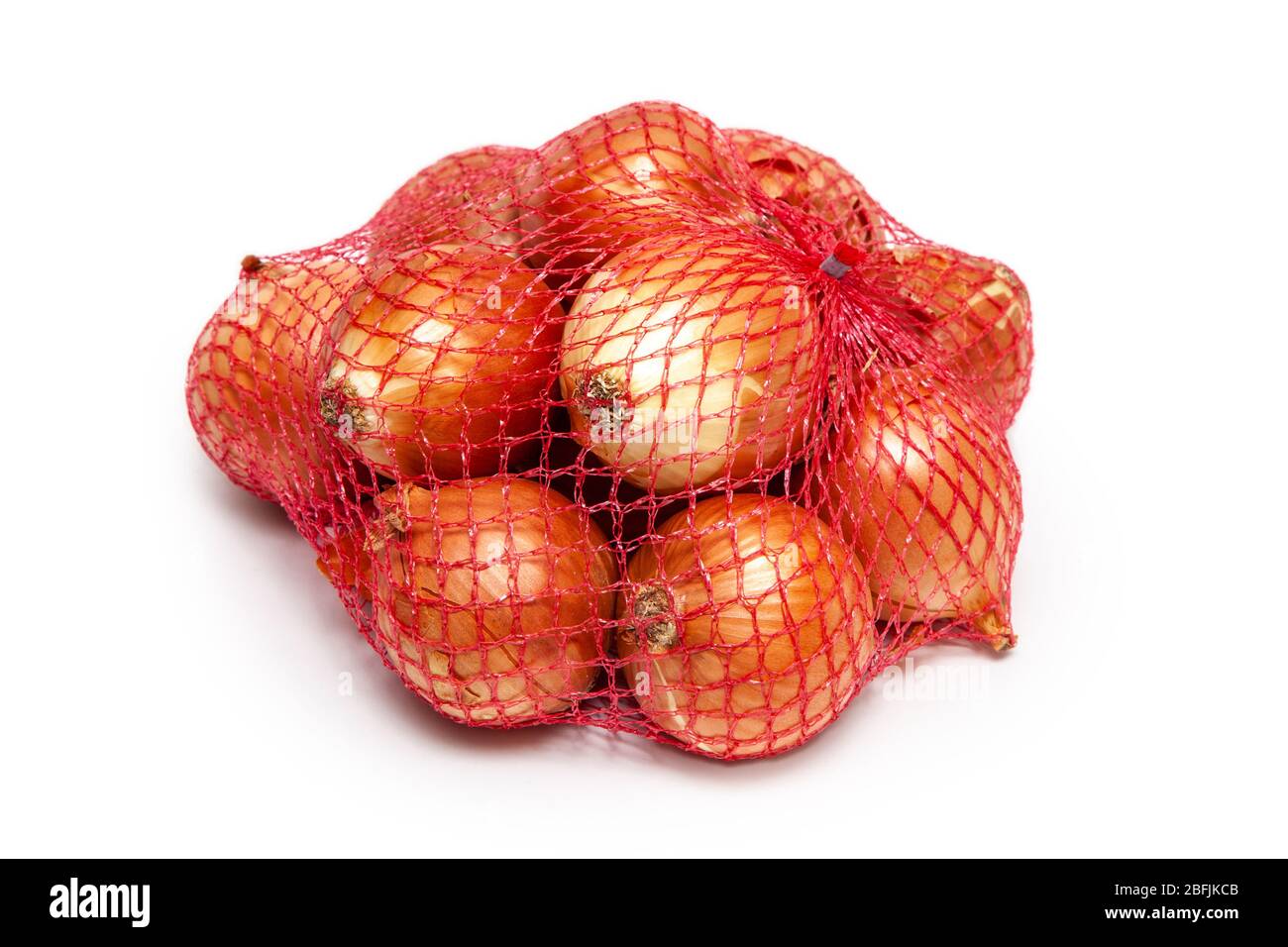 onions in a red packing net isolated on white background Stock Photo ...