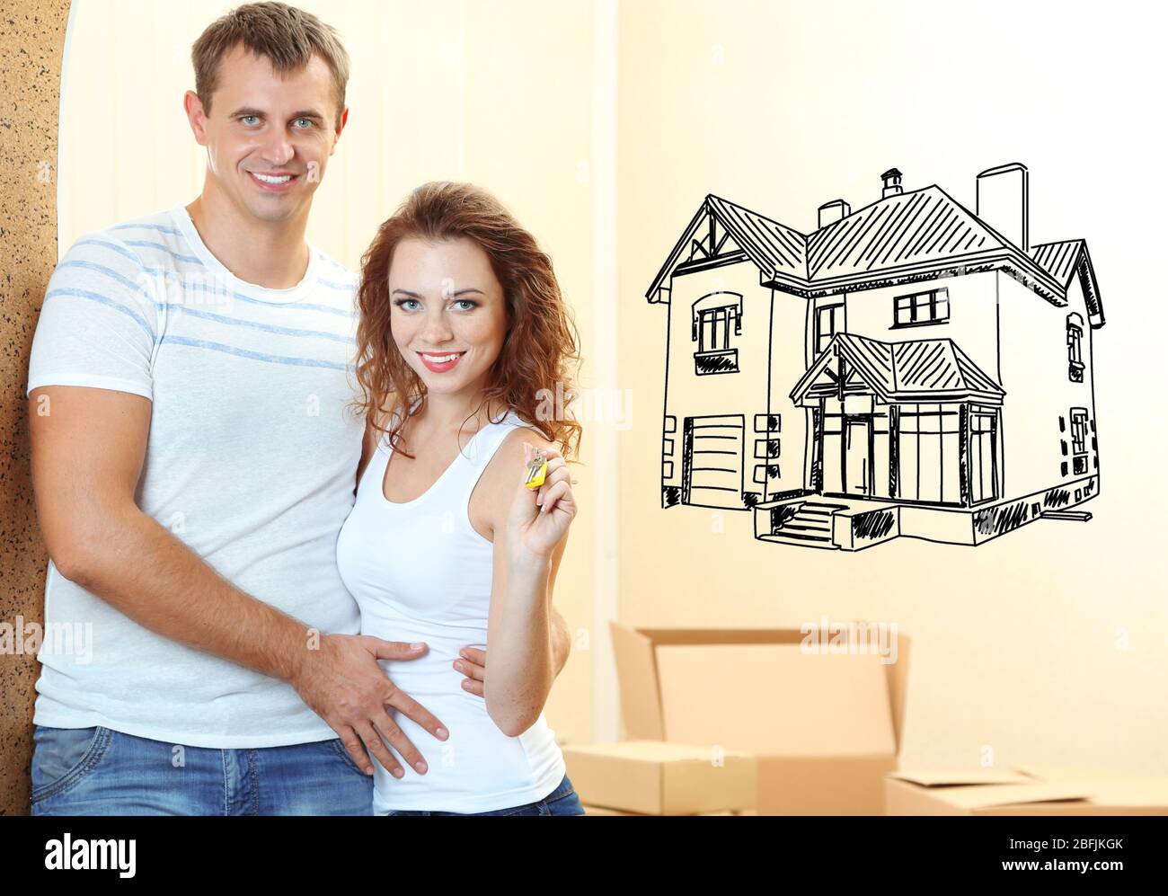 Young family and house drawing Stock Photo - Alamy