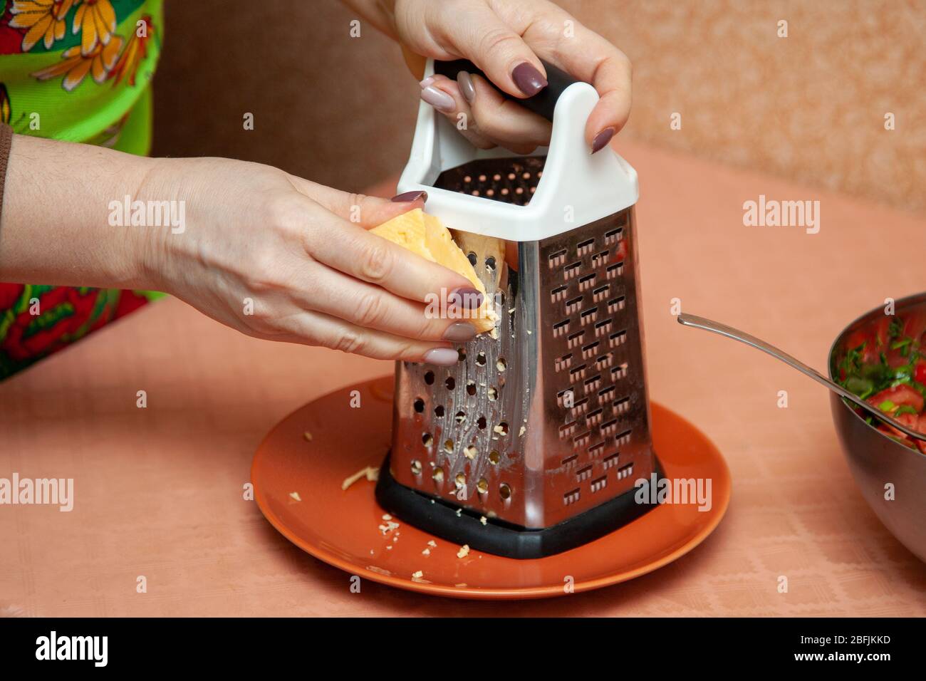 Grating cheese grater hands hi-res stock photography and images - Alamy