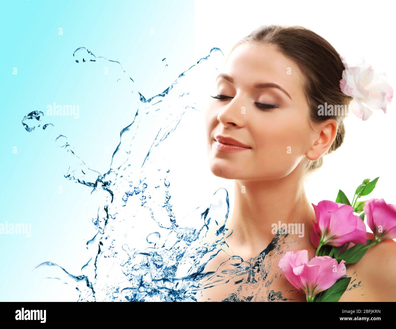Beautiful young woman and water splash on light background Stock Photo ...