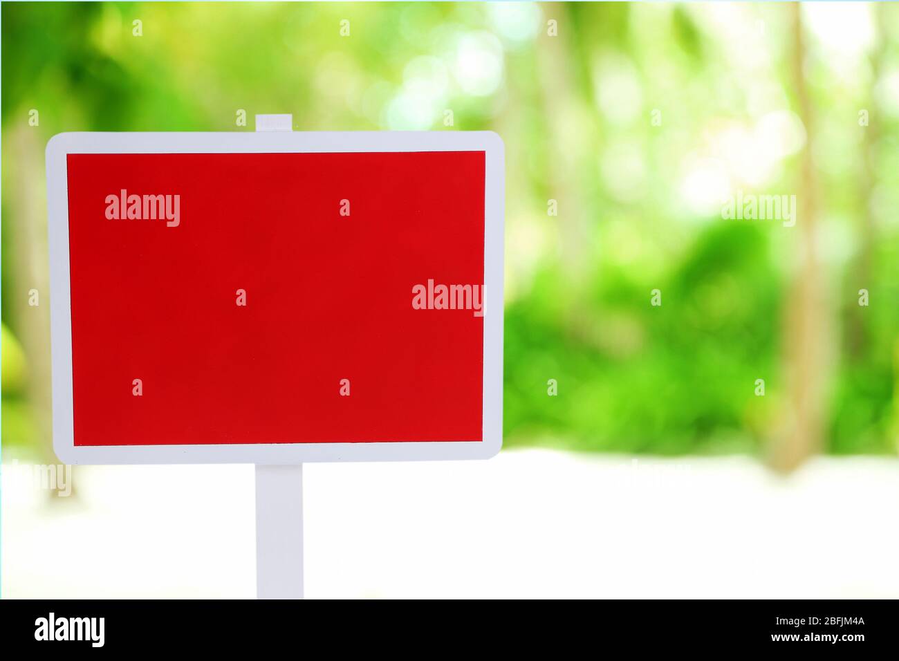 Wooden sign board on nature background Stock Photo - Alamy