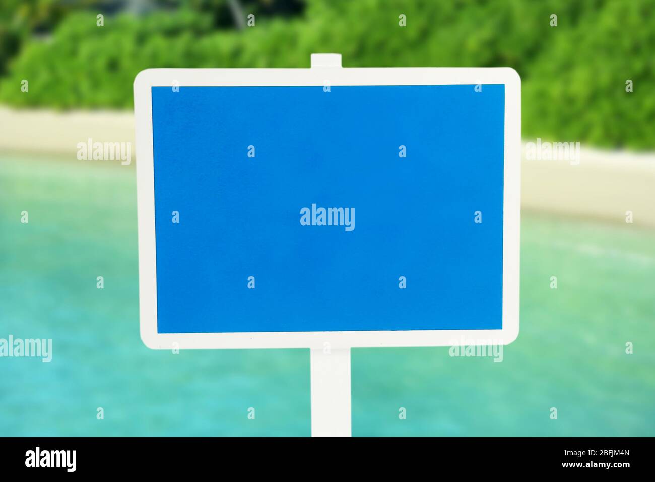 Wooden sign board on nature background Stock Photo - Alamy