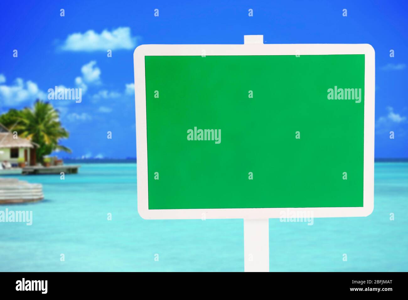 Wooden sign board on ocean background Stock Photo - Alamy