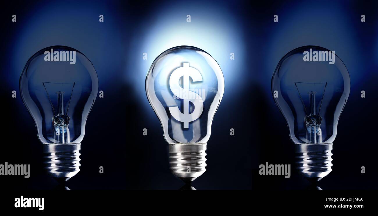Light bulb with Dollar symbol on dark background Stock Photo - Alamy