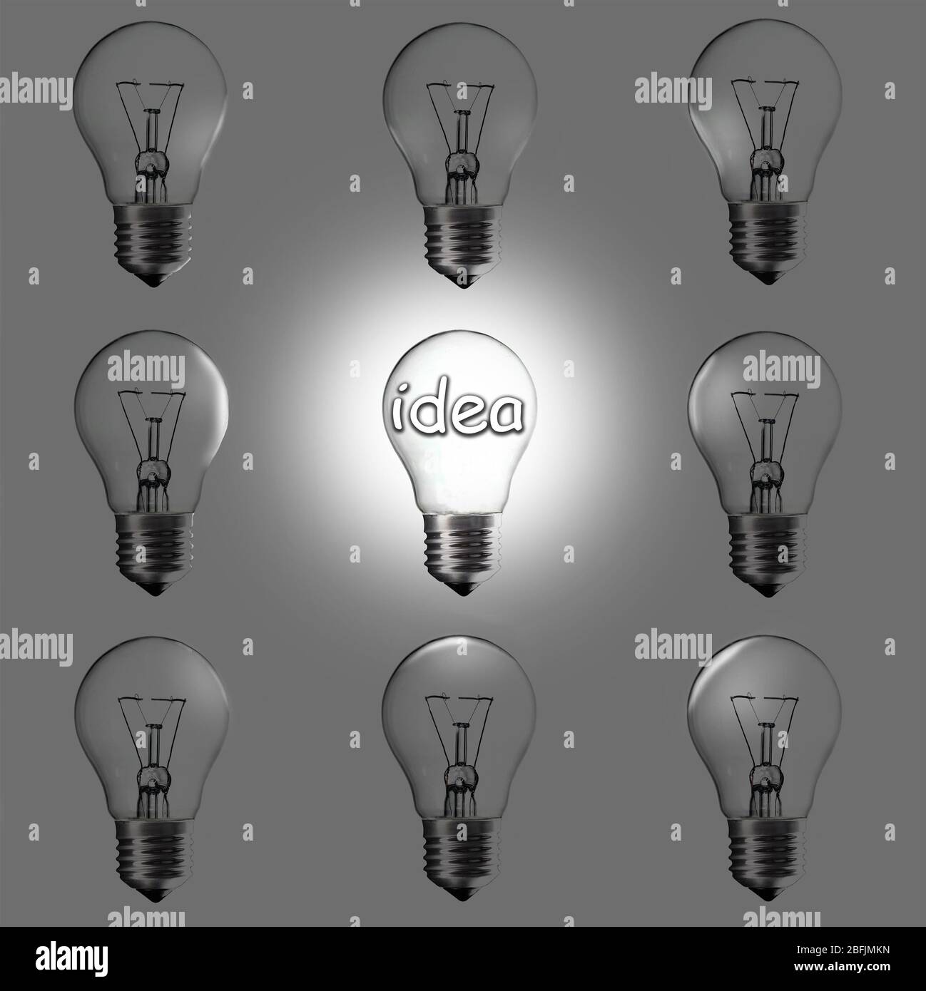 Light bulbs with on grey background Stock Photo - Alamy