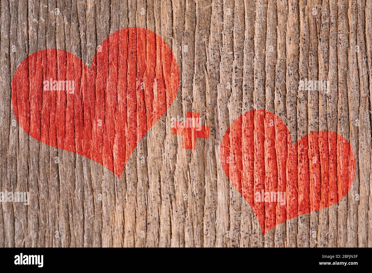 Love concept. Drawing on wooden wall background Stock Photo - Alamy