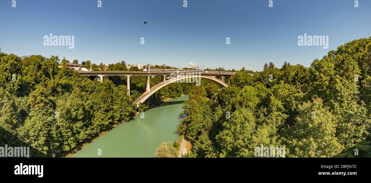 Bern, Switzerland - July 30, 2019: Railway bridge over the river. Train ...