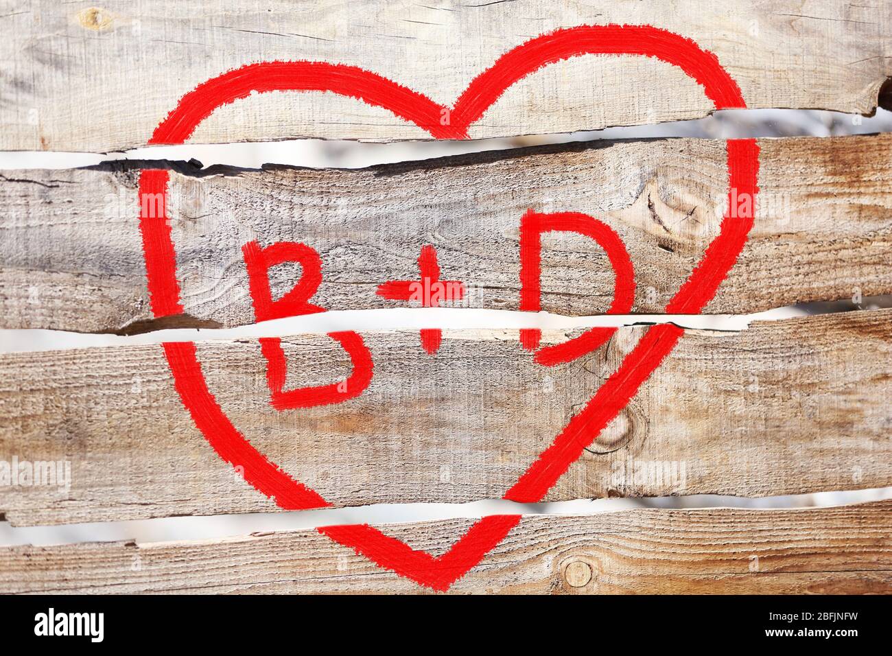 Love concept. Drawing on wooden wall background Stock Photo - Alamy