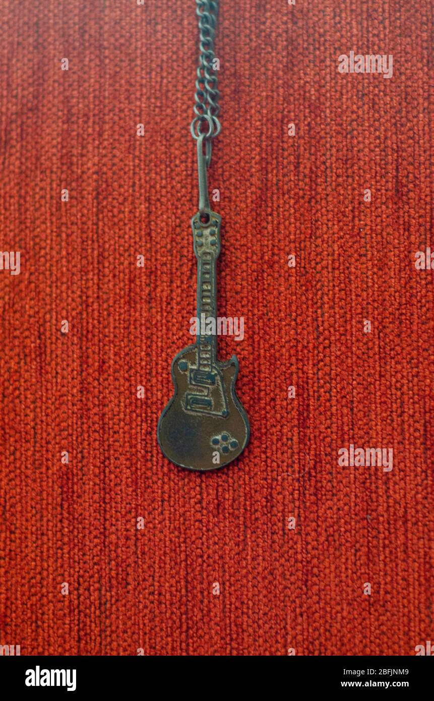 Guitar pendant hi-res stock photography and images - Alamy