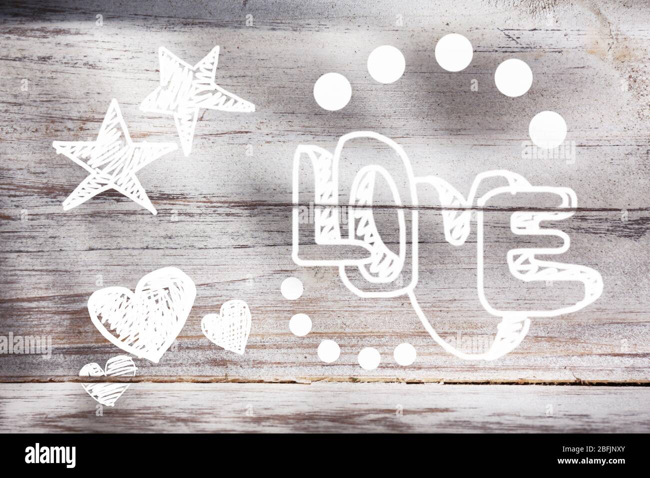 Love concept. Drawing on wooden wall background Stock Photo - Alamy