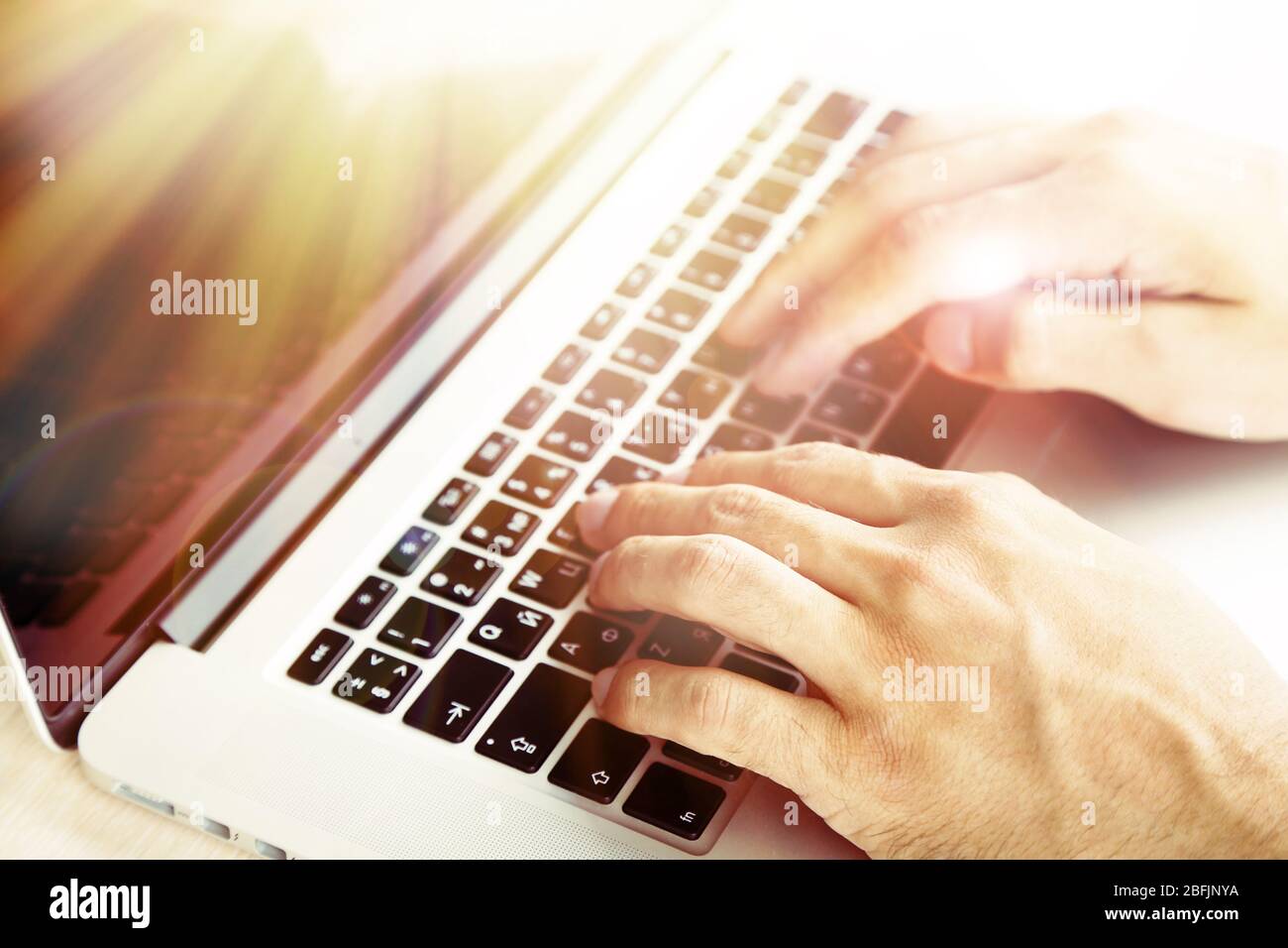 Keyboard screen hands closeup colour hi-res stock photography and ...