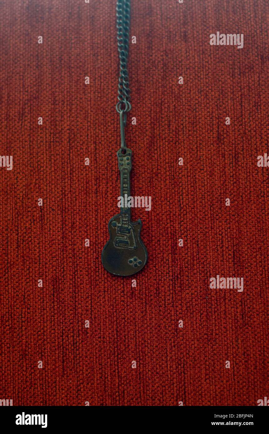 Guitar pendant hi-res stock photography and images - Alamy