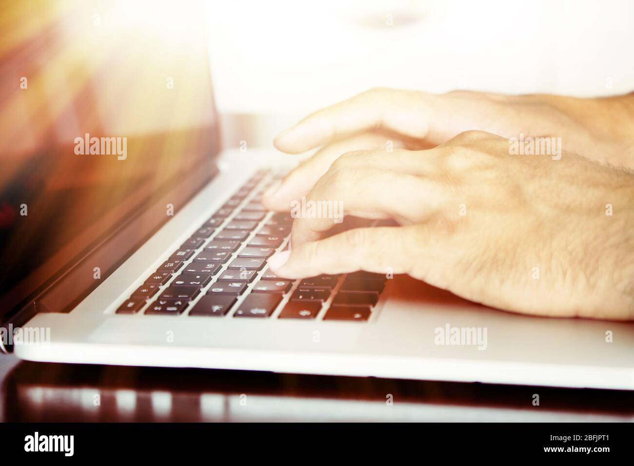 Keyboard screen hands closeup colour hi-res stock photography and ...