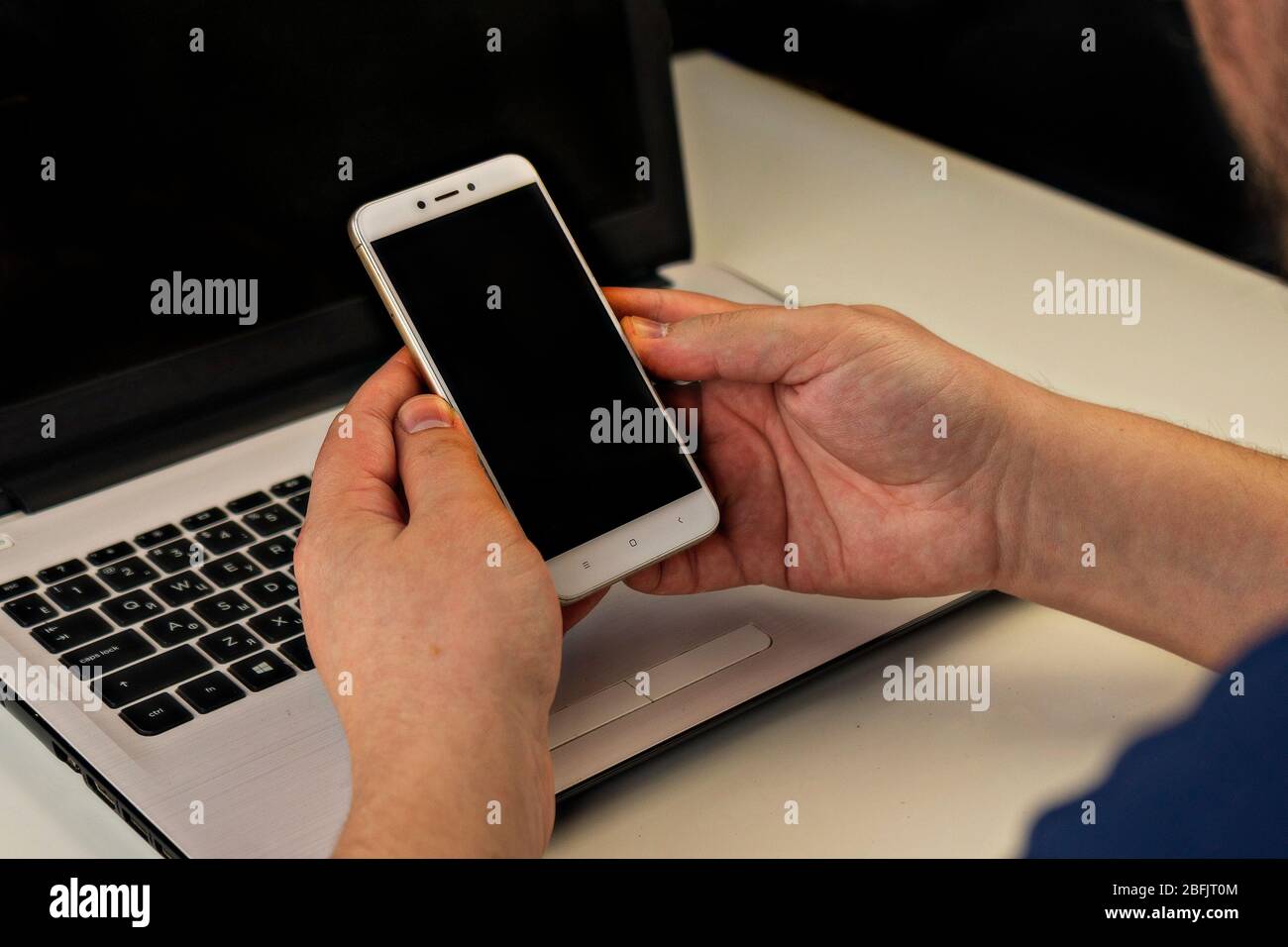 Hand man above computer hi-res stock photography and images - Alamy