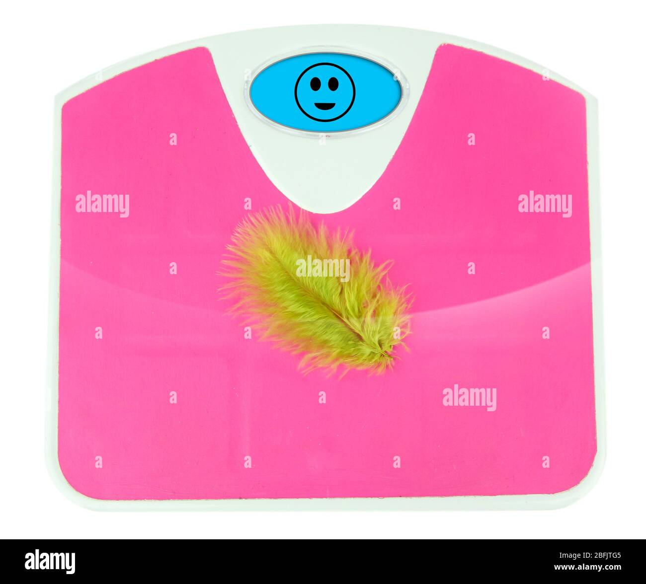 Feather on scales isolated on white Stock Photo - Alamy