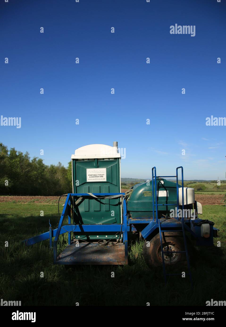 Hired portable toilet for seasonal farm workers Stock Photo - Alamy