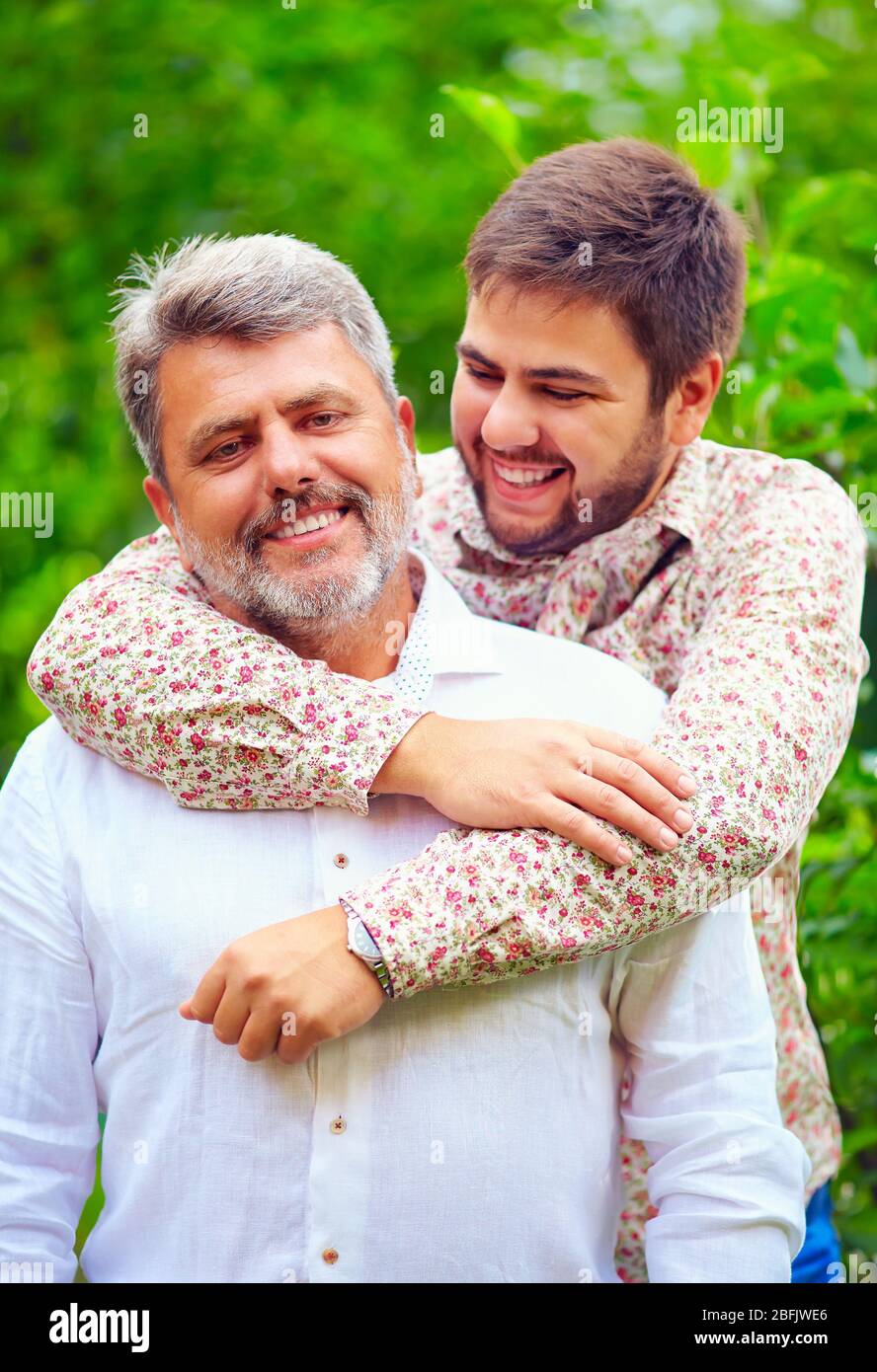 portrait of happy father and son, which are similar in appearance Stock ...