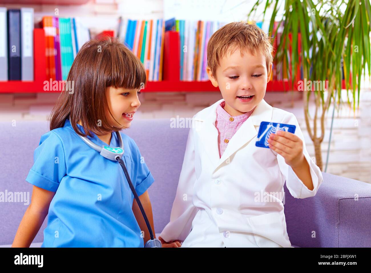 cute kids playing doctors in office Stock Photo - Alamy