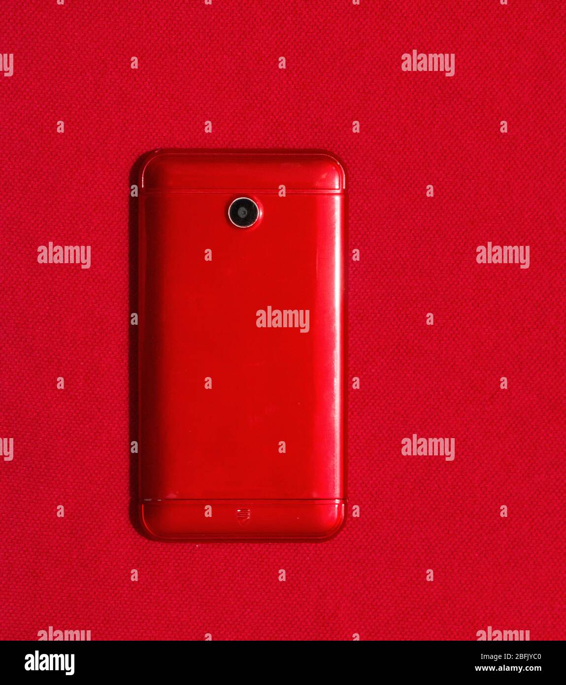 Red color mobile phone.Back side of a mobole phone Stock Photo - Alamy