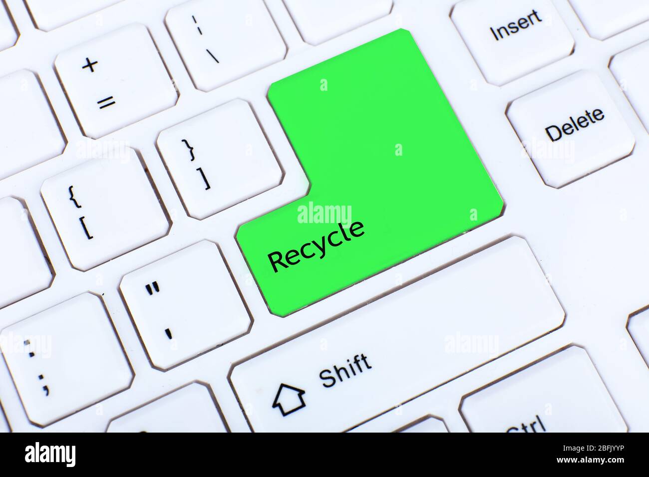 Close up of keyboard with Recycle sign Stock Photo - Alamy