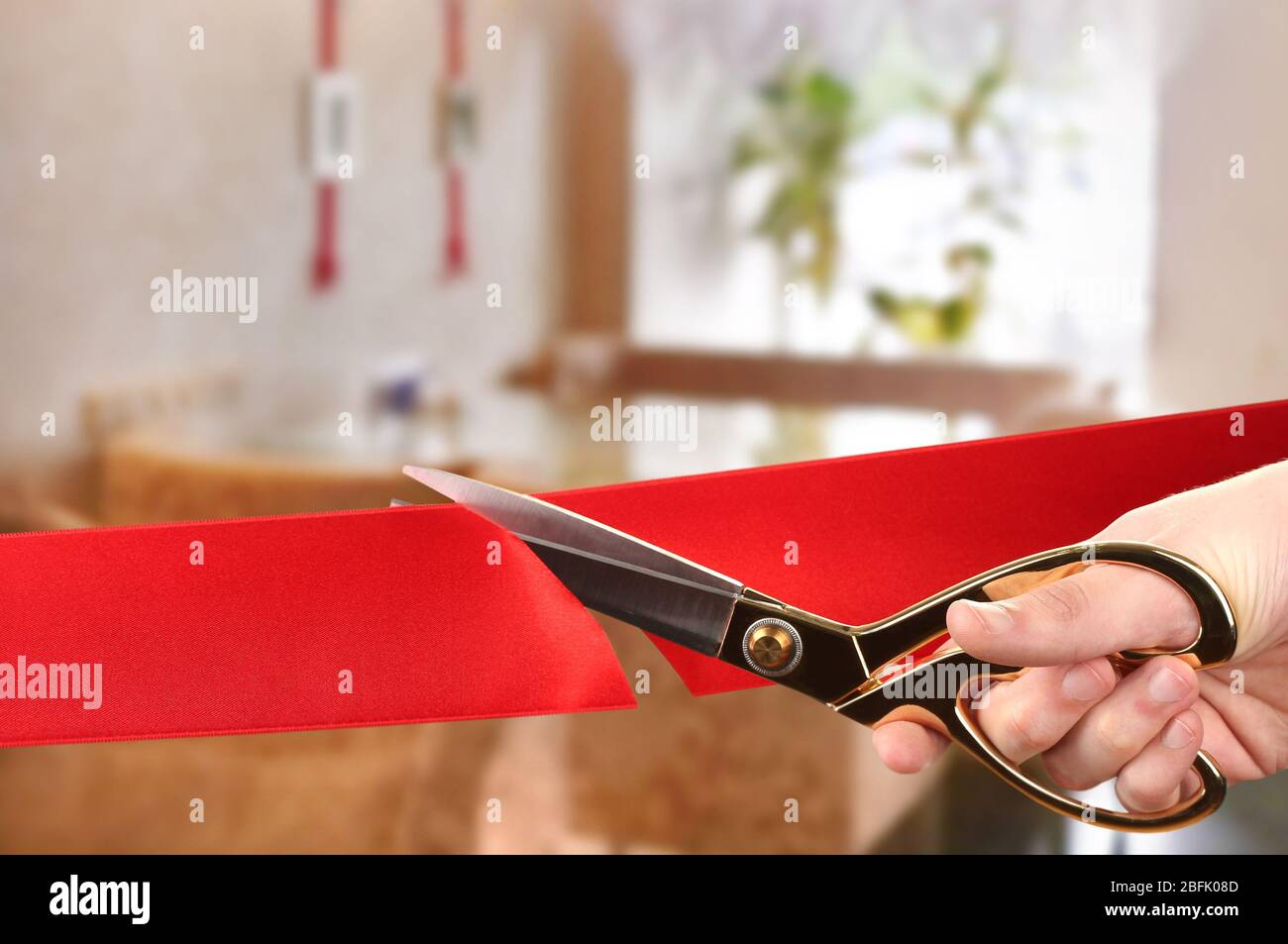 Grand opening, cutting red ribbon Stock Photo - Alamy