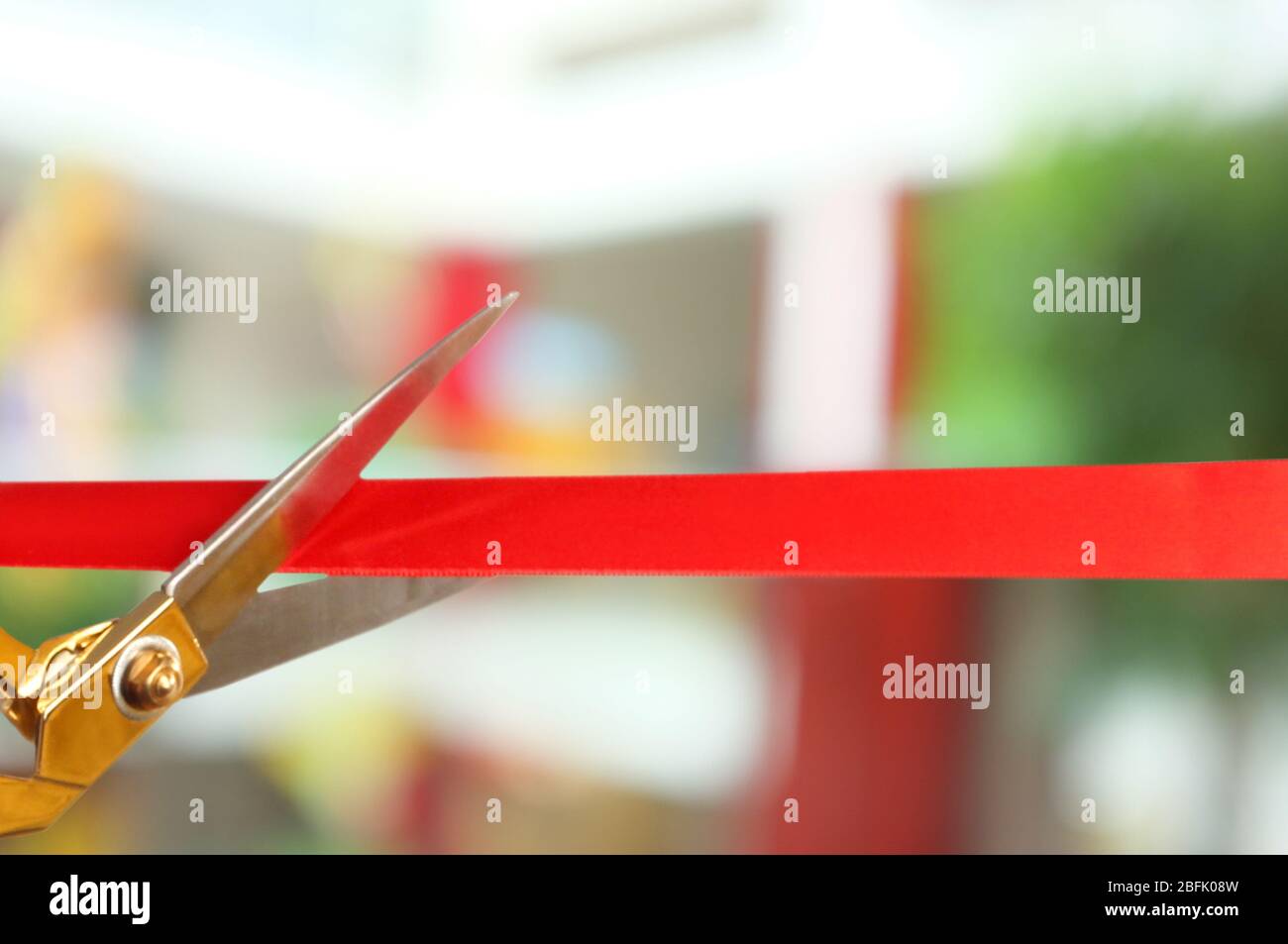 Grand opening, cutting red ribbon Stock Photo - Alamy