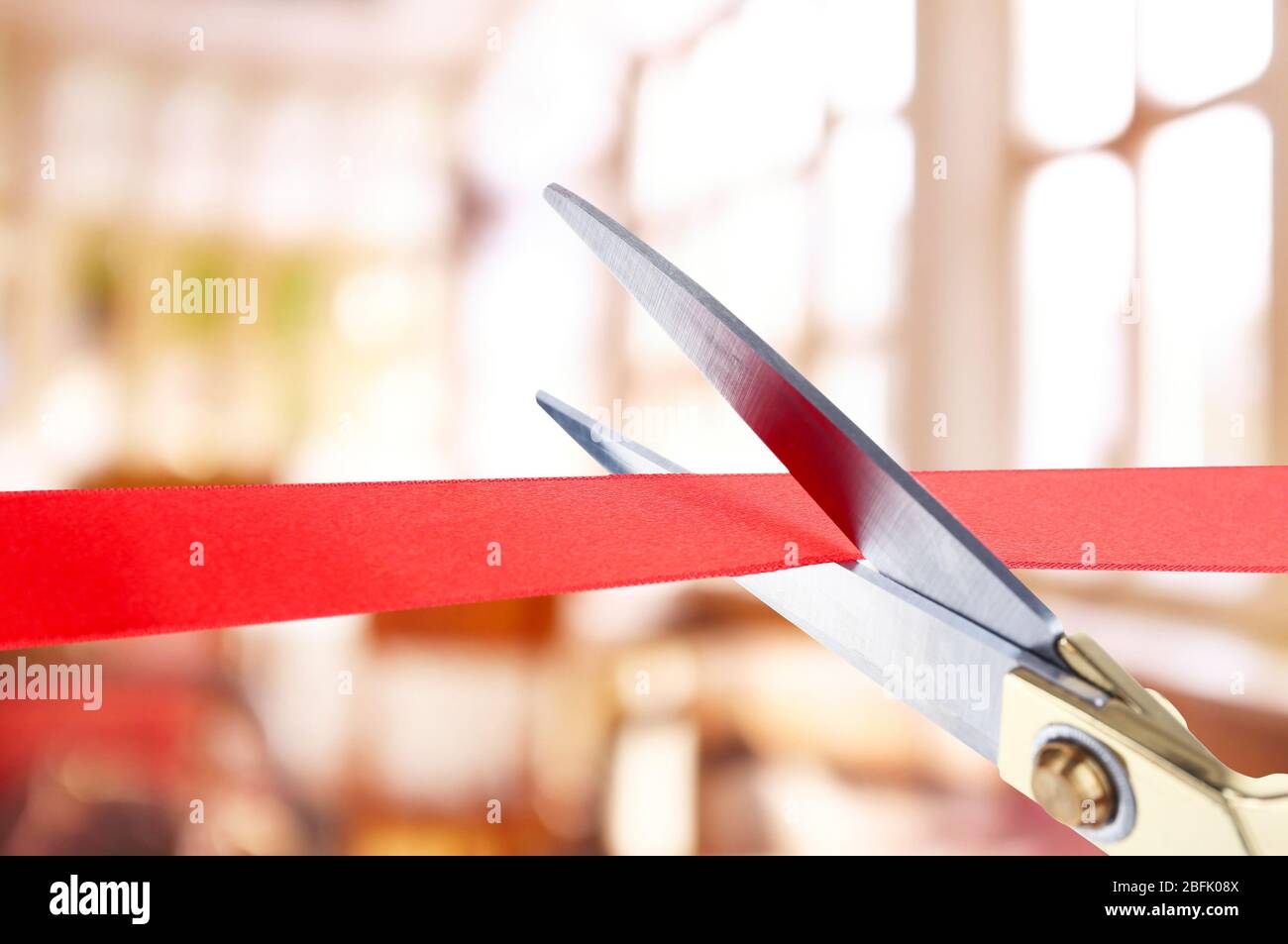 Grand opening, cutting red ribbon Stock Photo - Alamy