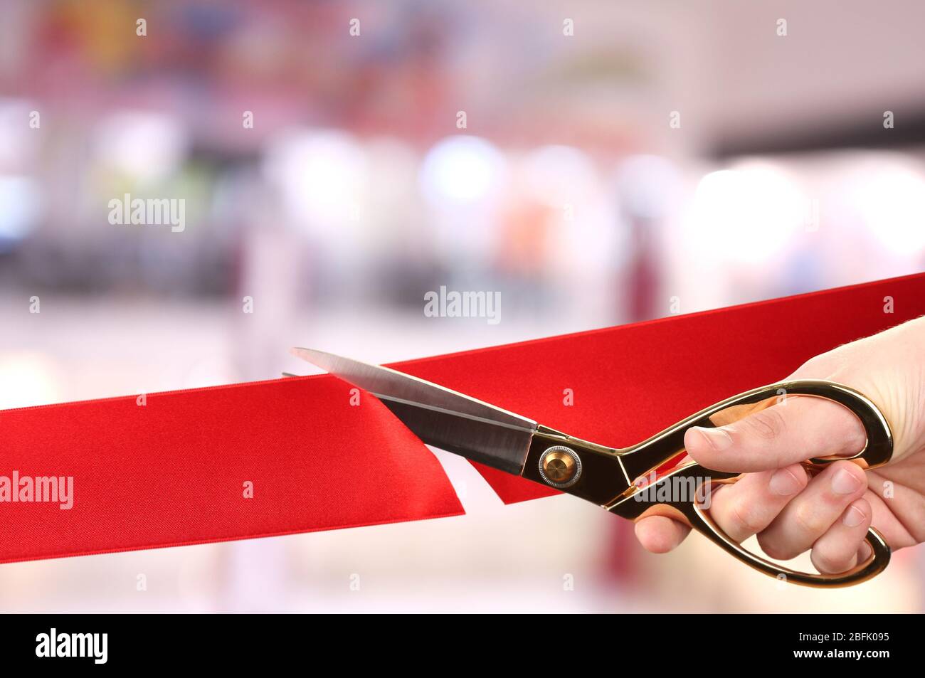 Grand opening, cutting red ribbon Stock Photo - Alamy