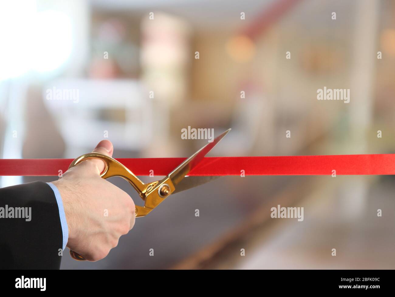 Grand opening, cutting red ribbon Stock Photo - Alamy