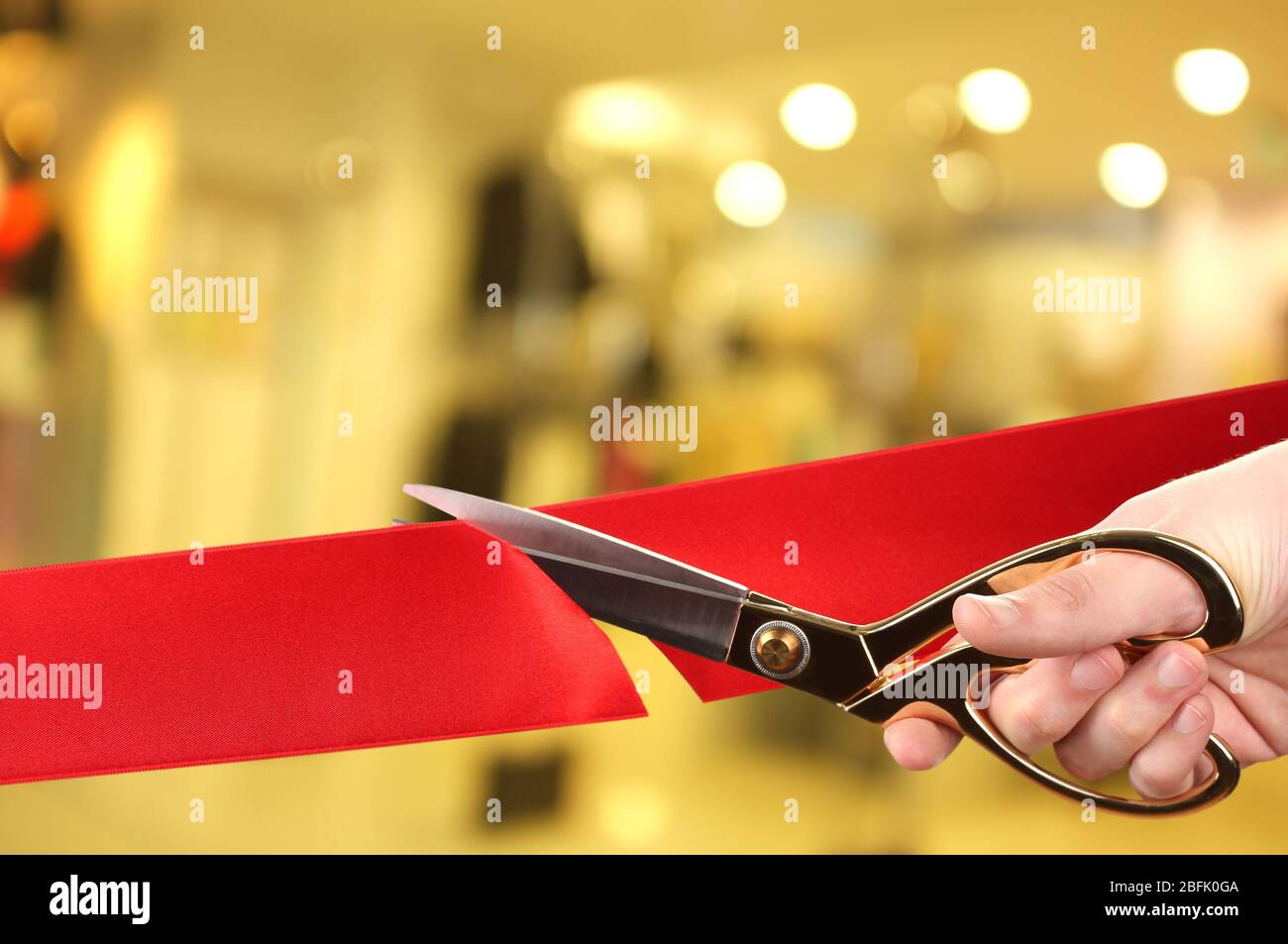 Grand opening, cutting red ribbon Stock Photo - Alamy
