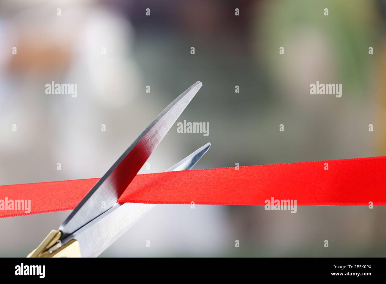 Grand opening, cutting red ribbon Stock Photo - Alamy