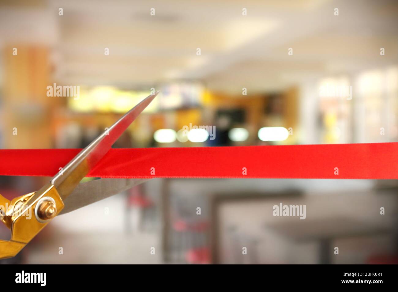 Grand opening, cutting red ribbon Stock Photo - Alamy