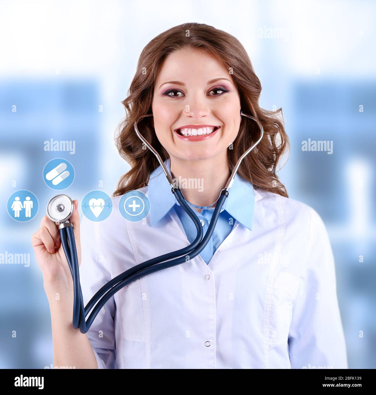 Female doctor with stethoscope and virtual screen Stock Photo - Alamy