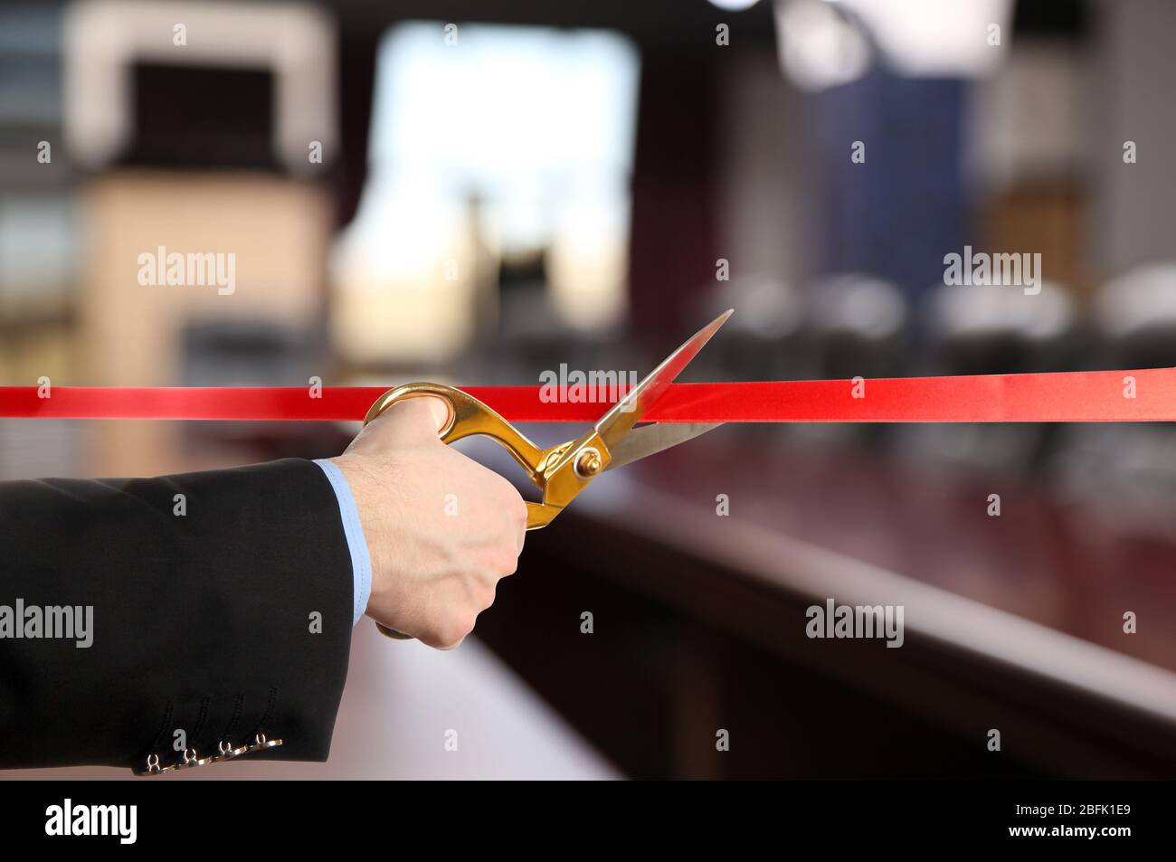 Grand opening, cutting red ribbon Stock Photo - Alamy