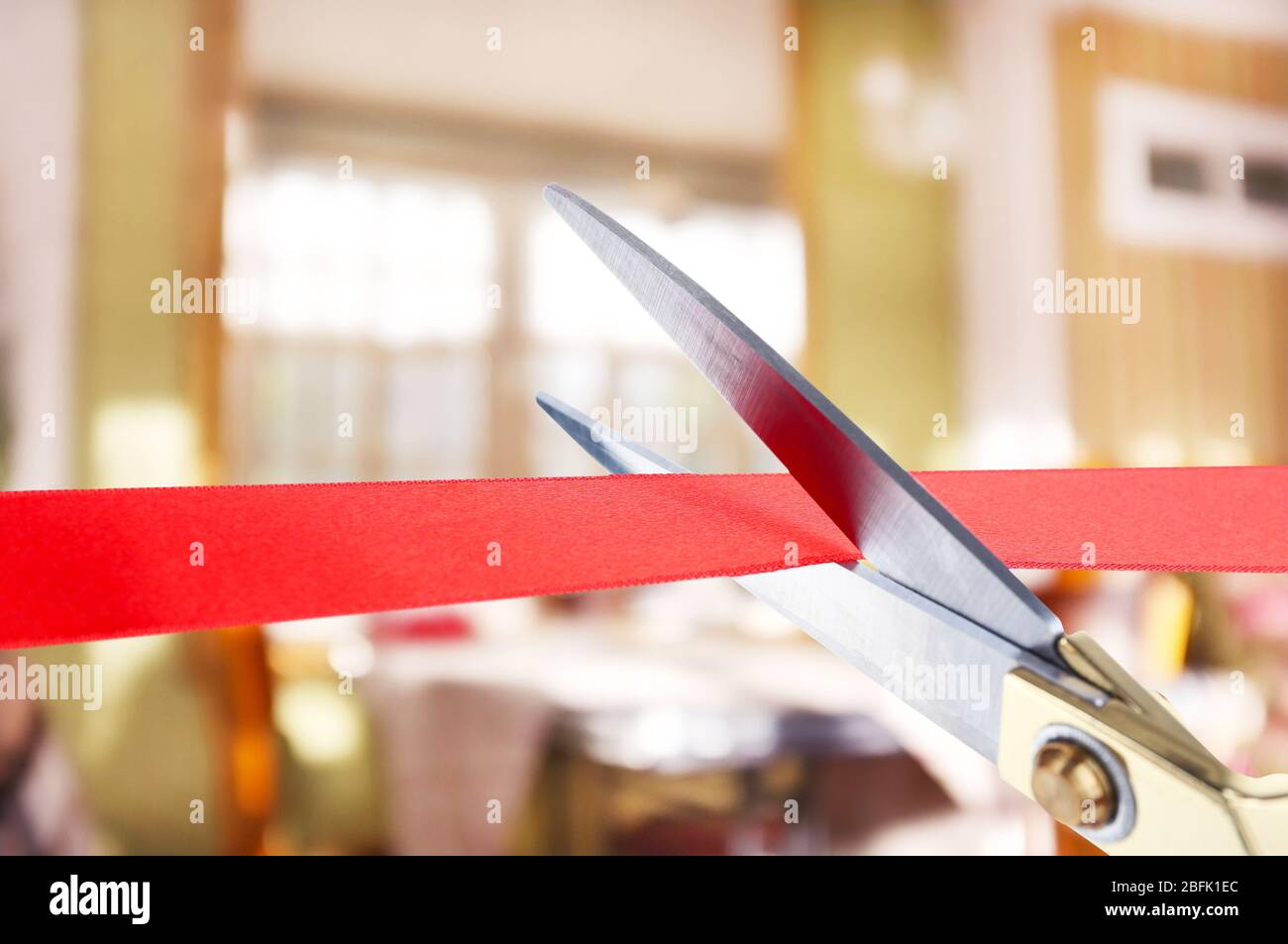 Grand opening, cutting red ribbon Stock Photo - Alamy