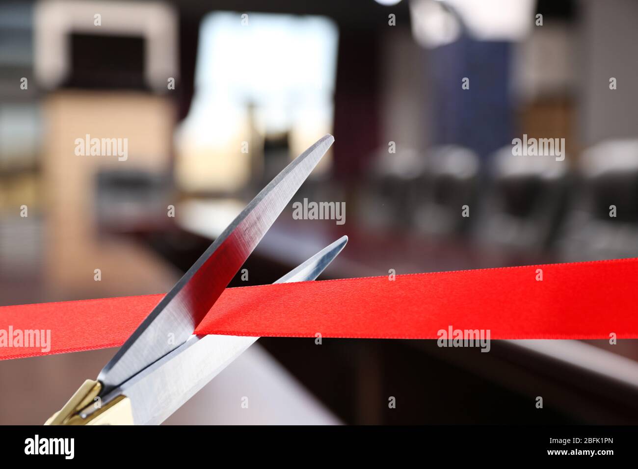Grand opening, cutting red ribbon Stock Photo - Alamy