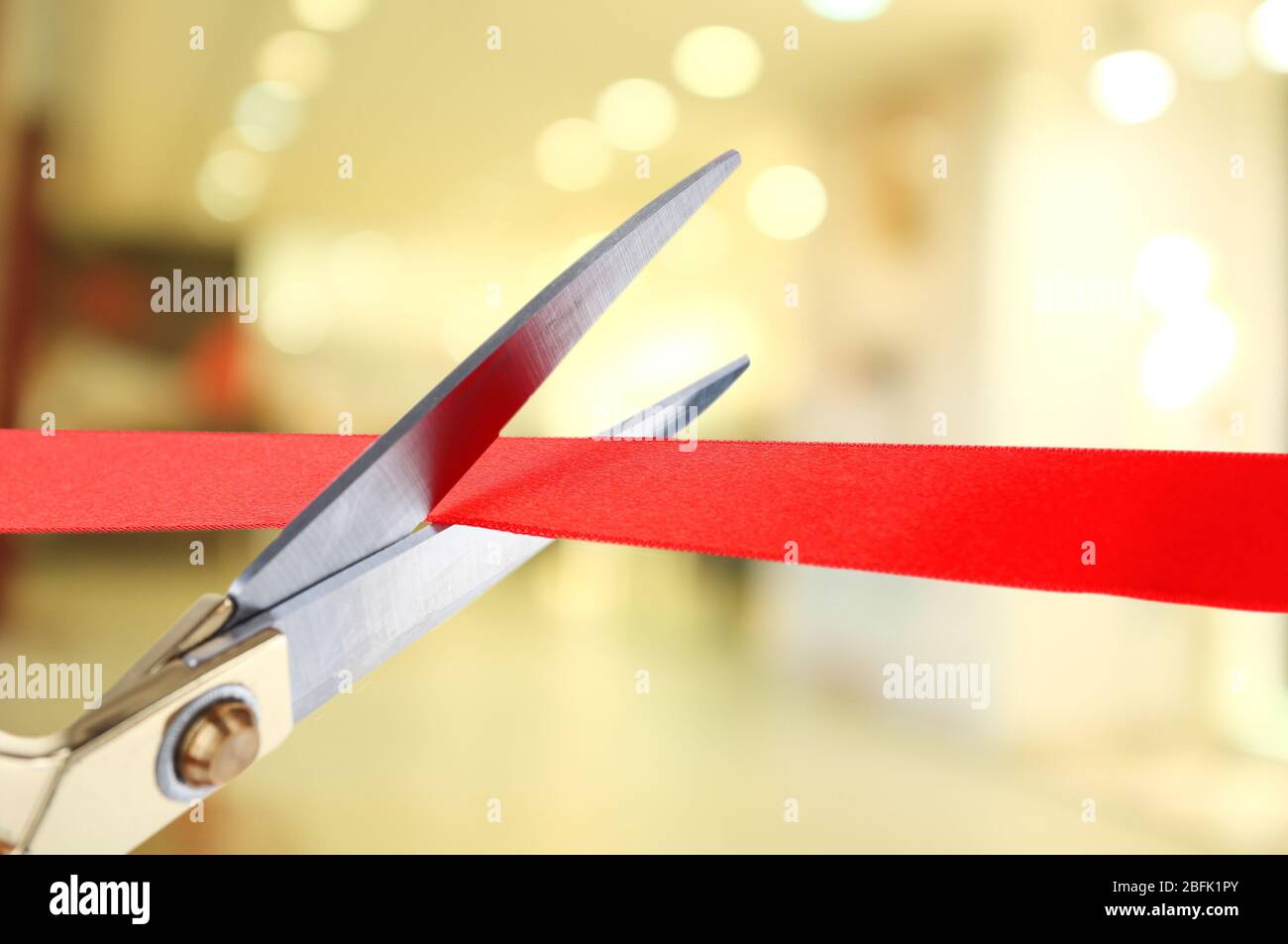Grand opening, cutting red ribbon Stock Photo - Alamy
