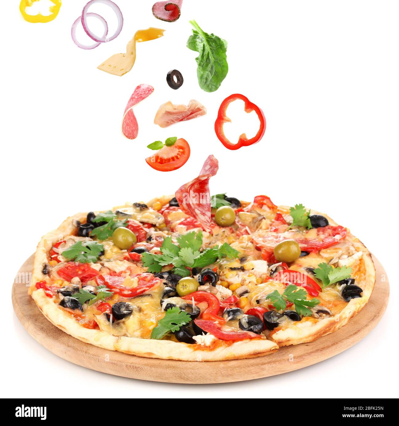 Tasty pizza and falling ingredients isolated on white Stock Photo - Alamy