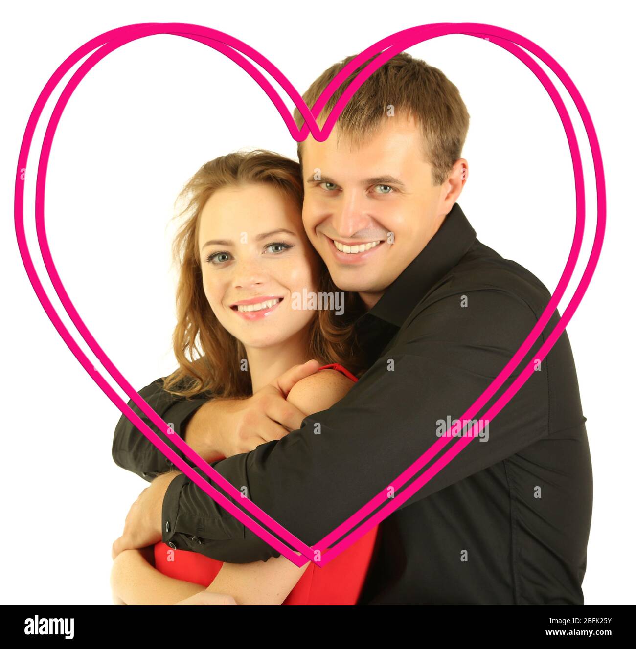 Beautiful loving couple kissing and heart-shaped frame isolated on ...