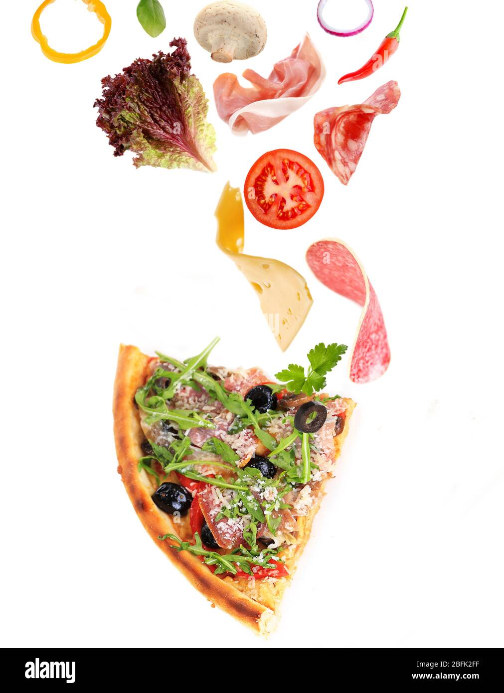 Tasty slice of pizza and falling ingredients isolated on white Stock ...