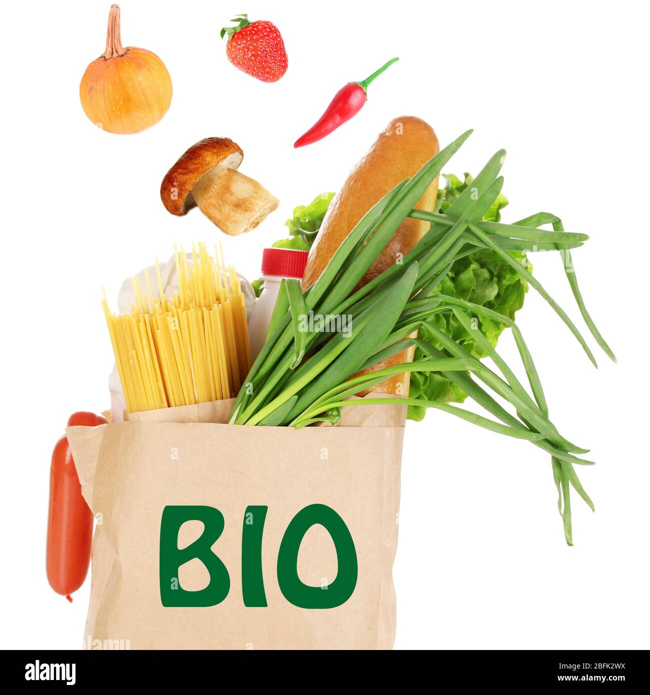 Paper bag with bio products isolated on white Stock Photo - Alamy
