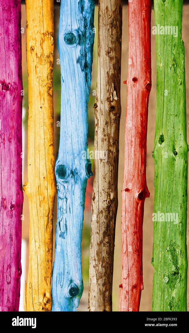 Colorful wooden logs background Stock Photo - Alamy