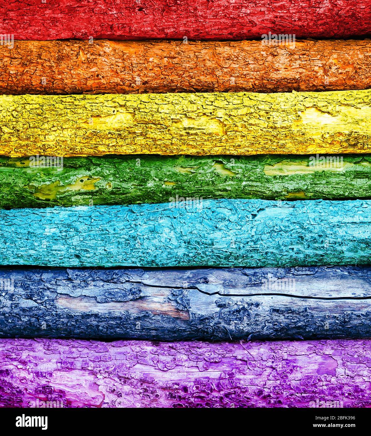 Colorful wooden logs background Stock Photo - Alamy