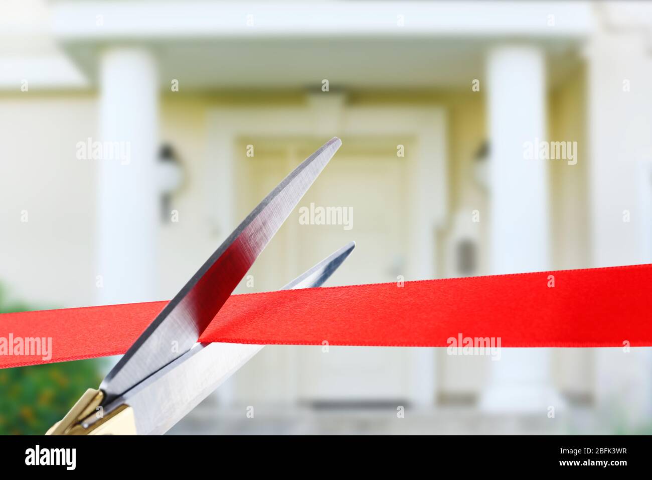 Grand opening, cutting red ribbon Stock Photo - Alamy