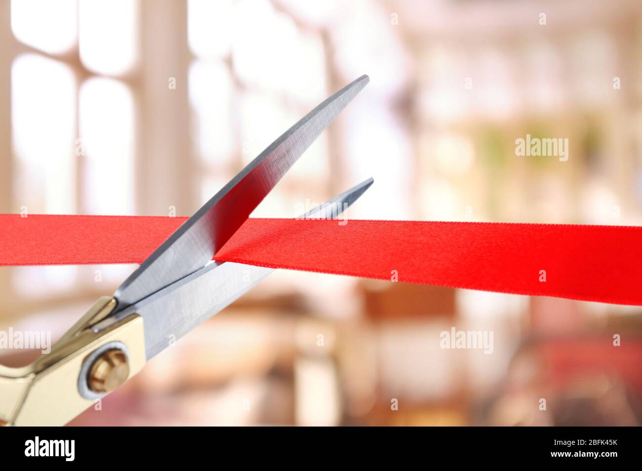 Grand opening, cutting red ribbon Stock Photo - Alamy